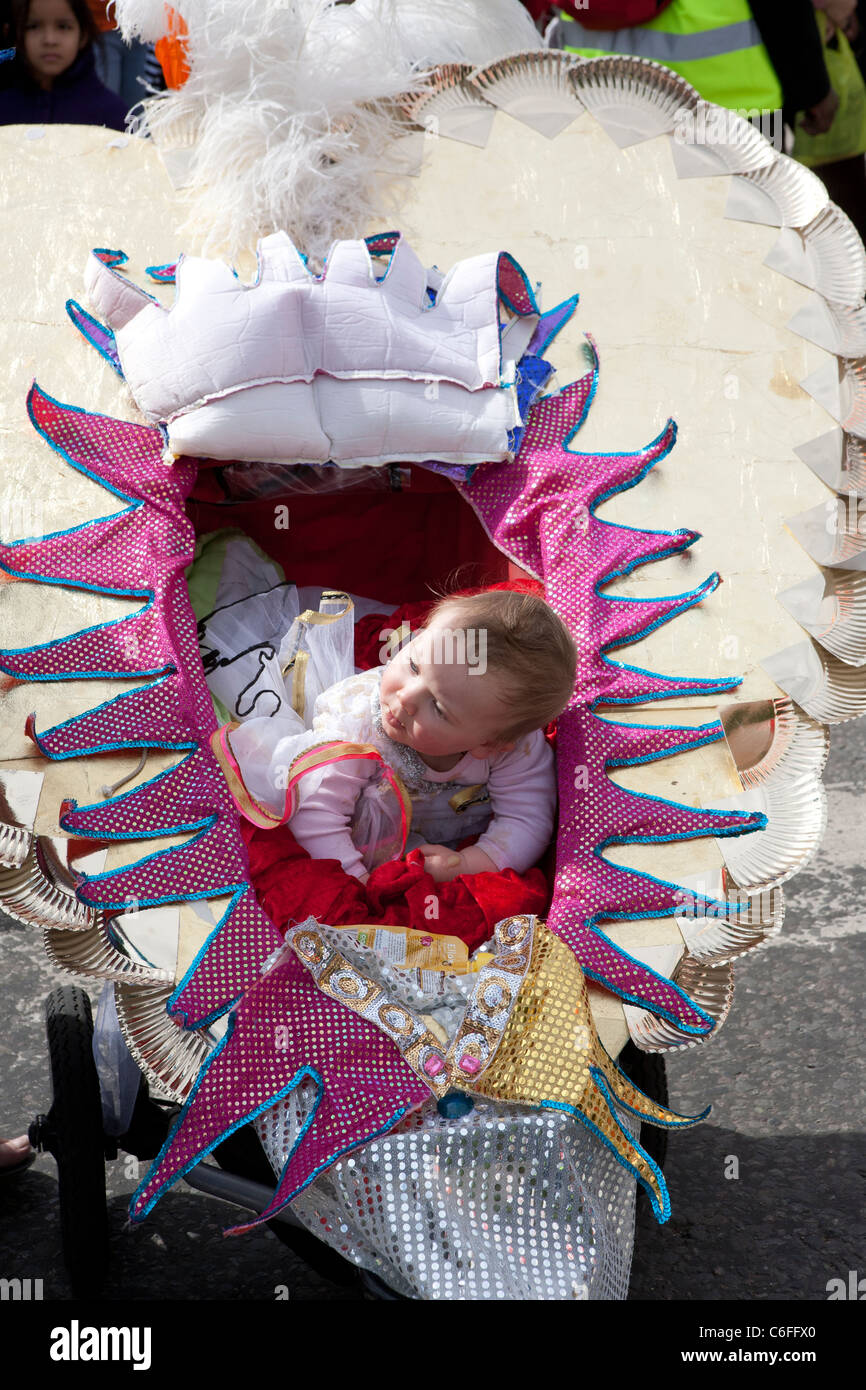Decorated buggy and baby at Notting Hill Carnival Stock Photo - Alamy