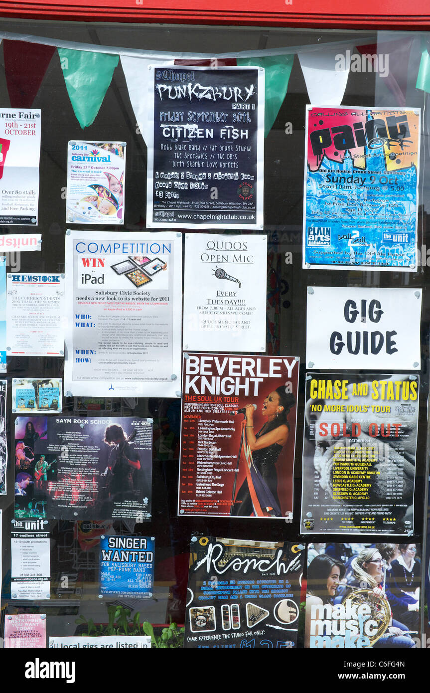 Posters in the window of a local information center Stock Photo - Alamy