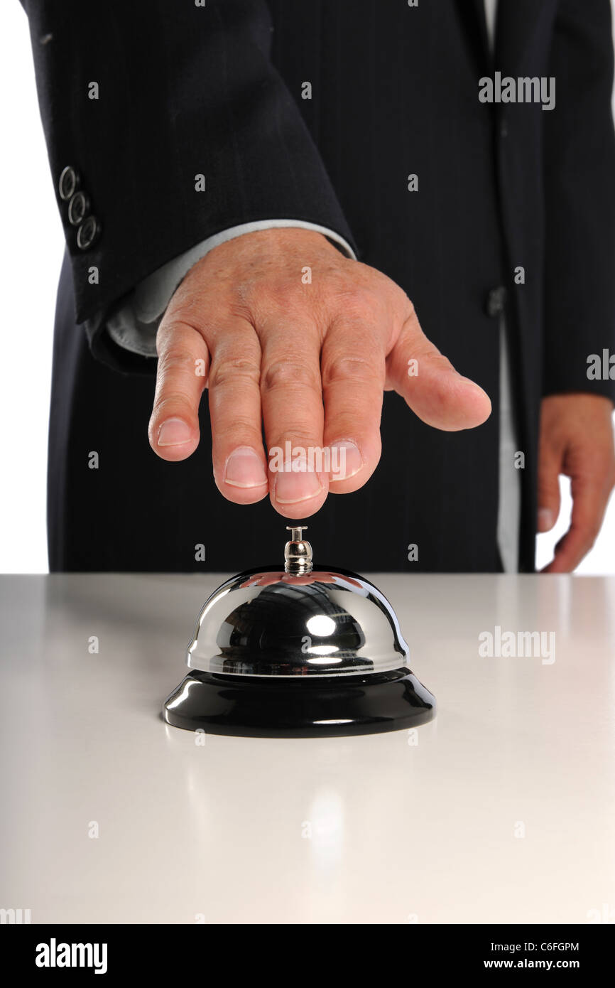 Hand of businessman ringing bell Stock Photo - Alamy