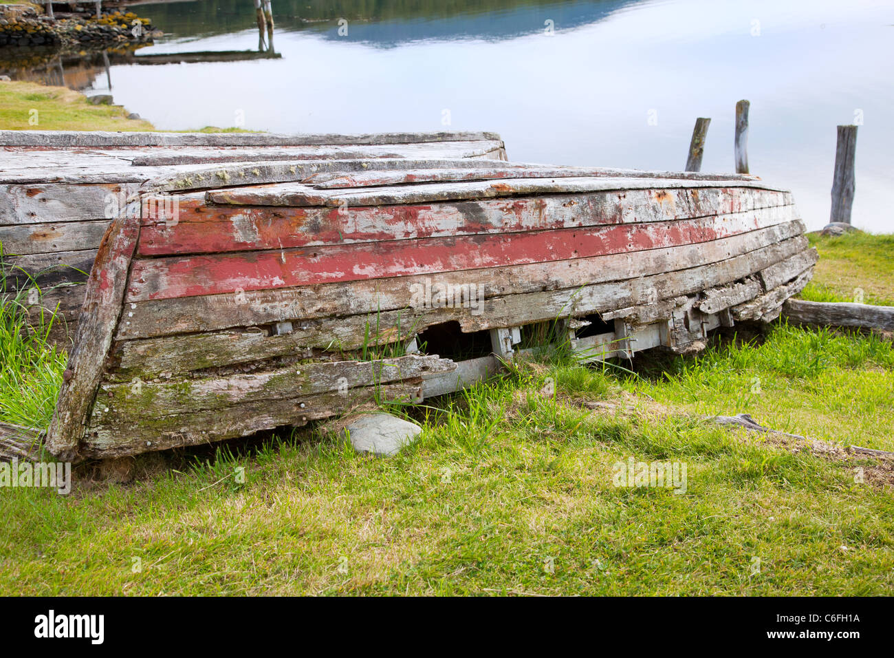 Very old rotten wooden row boat near the water Stock Photo - Alamy