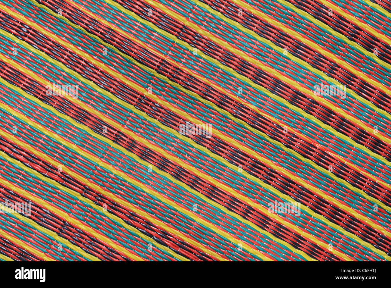 diagonal striped plastic beach mat background texture Stock Photo - Alamy
