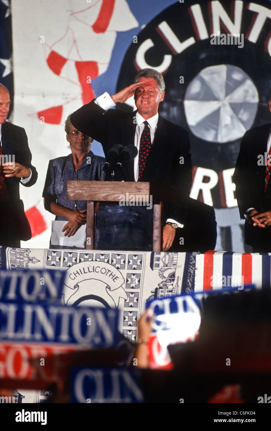 President Bill Clinton salutes his supporters during a campaign stop ...