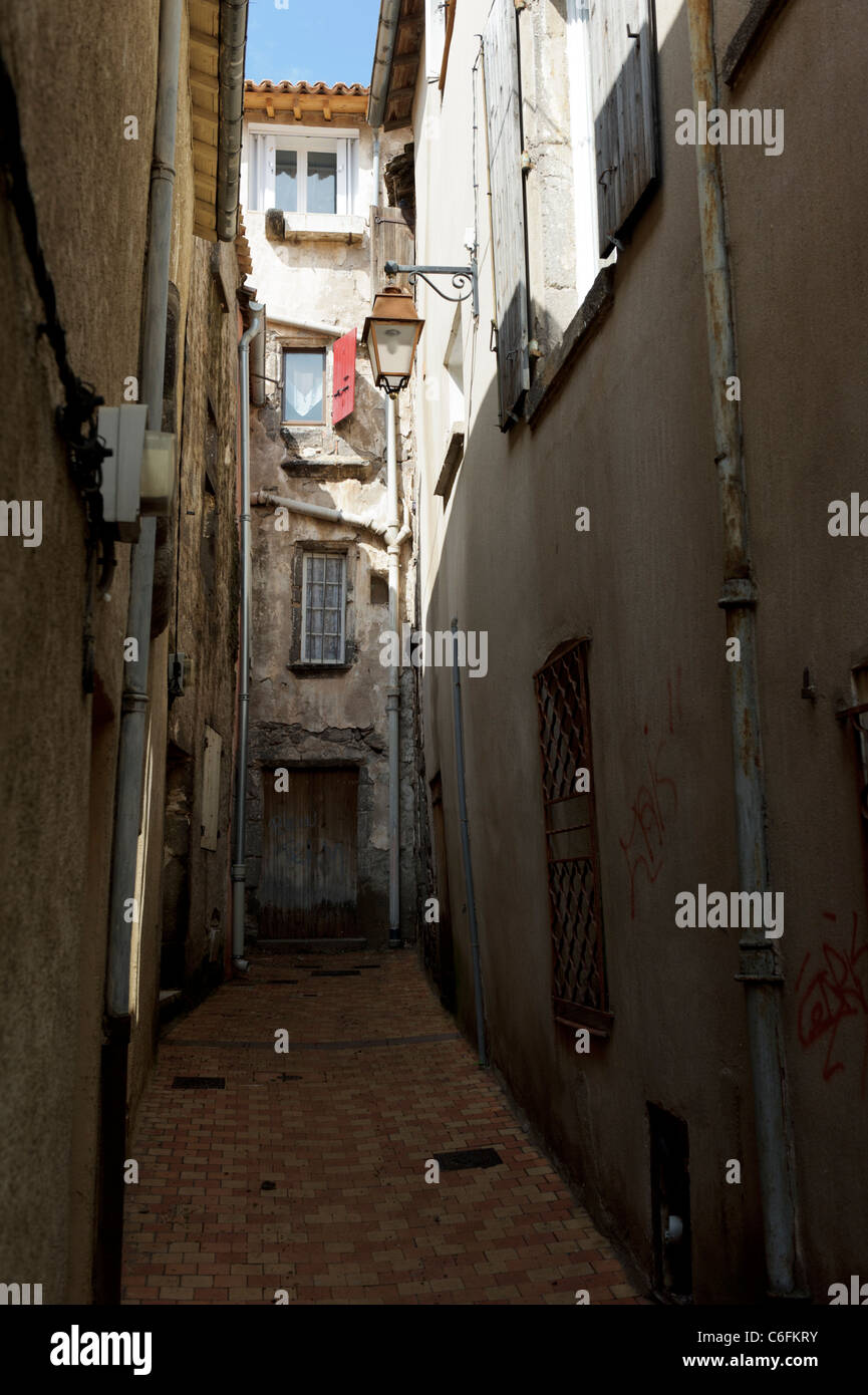 Scene in backstreet of old town, Agde, France Stock Photo - Alamy