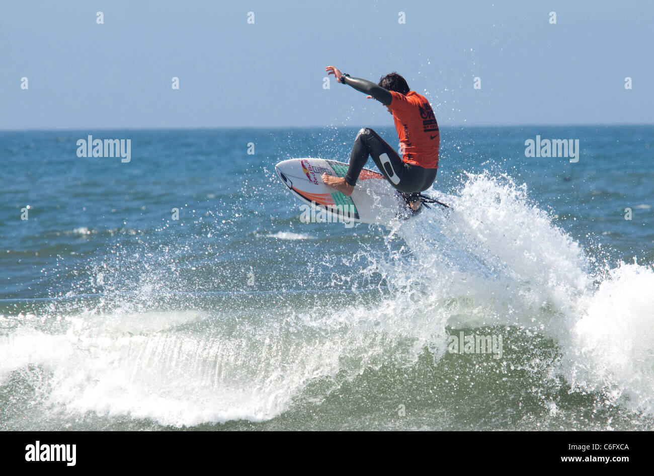Man surfing in the Pacific Ocean Stock Photo - Alamy