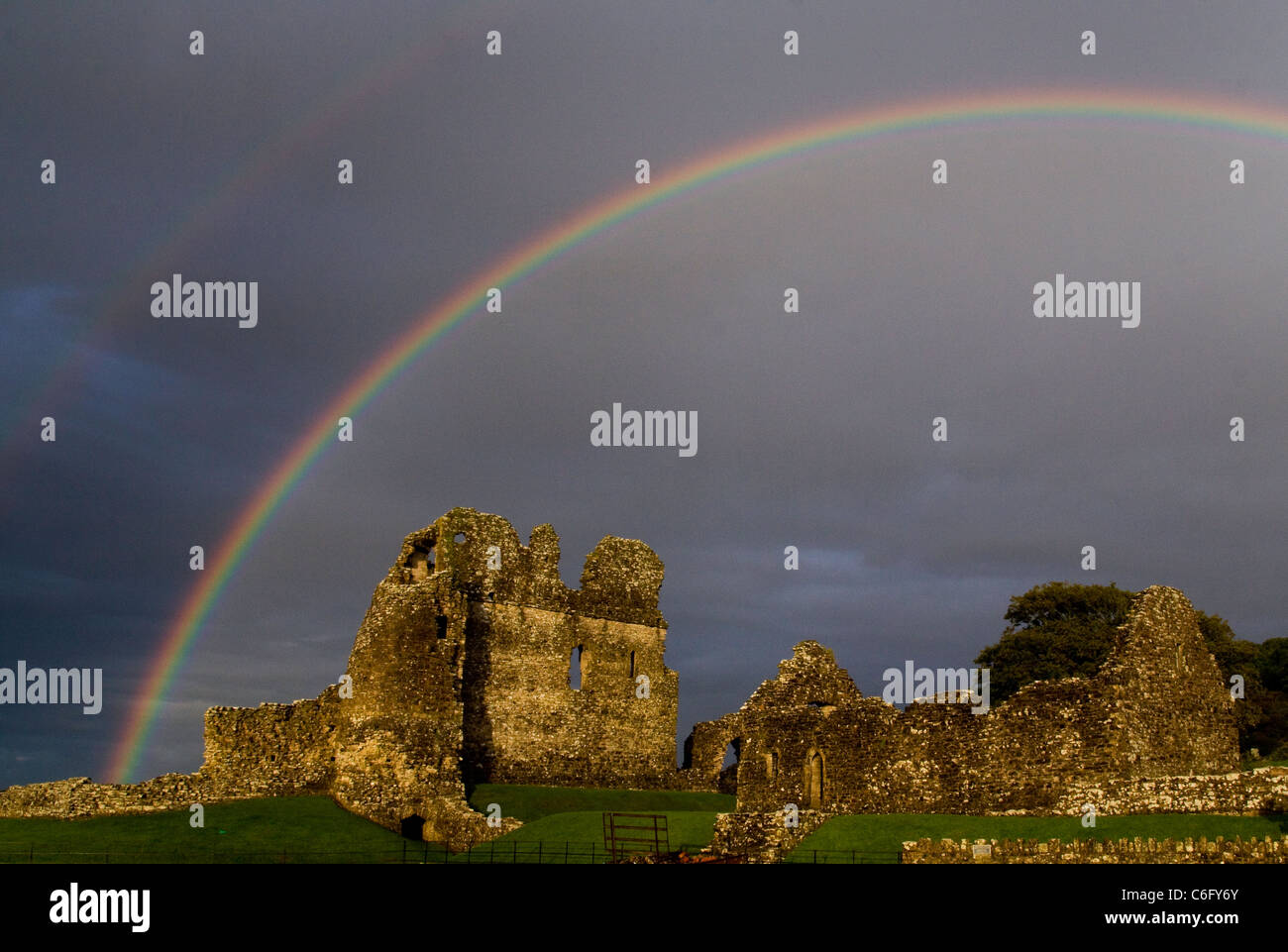 Ogmore castle with a double rainbow over it Stock Photo - Alamy