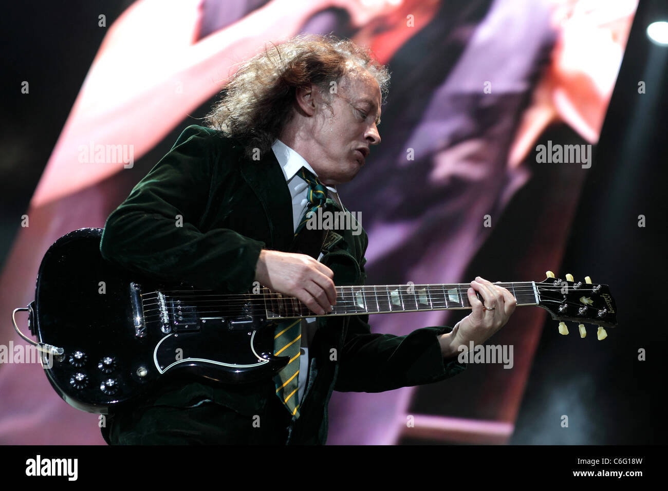 Angus Young of ACDC performing live in concert as part of the "Black ...