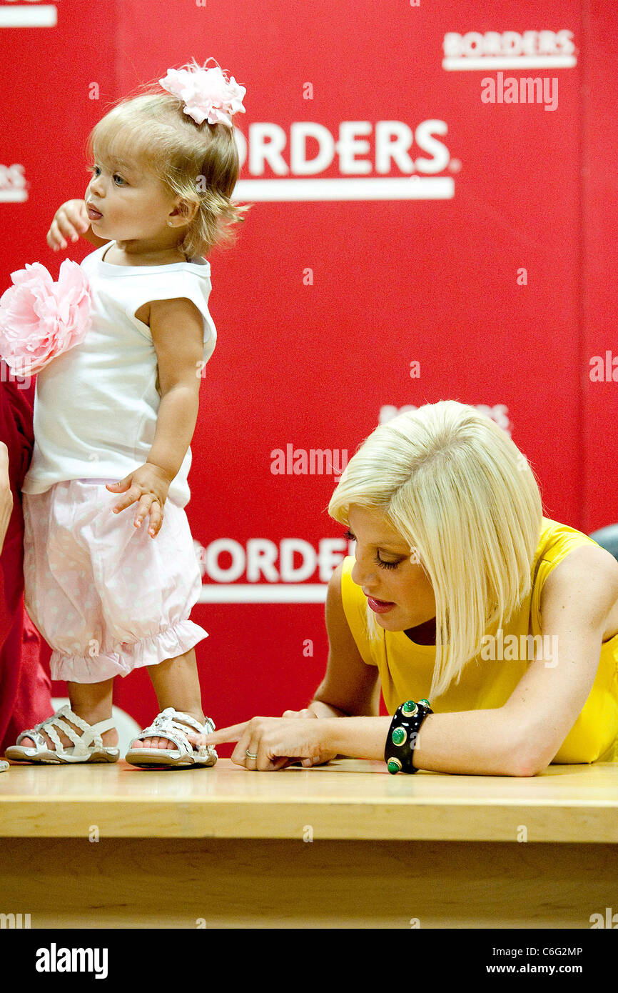 Tori Spelling signs copies of her new book 'uncharted terriTORI' at ...