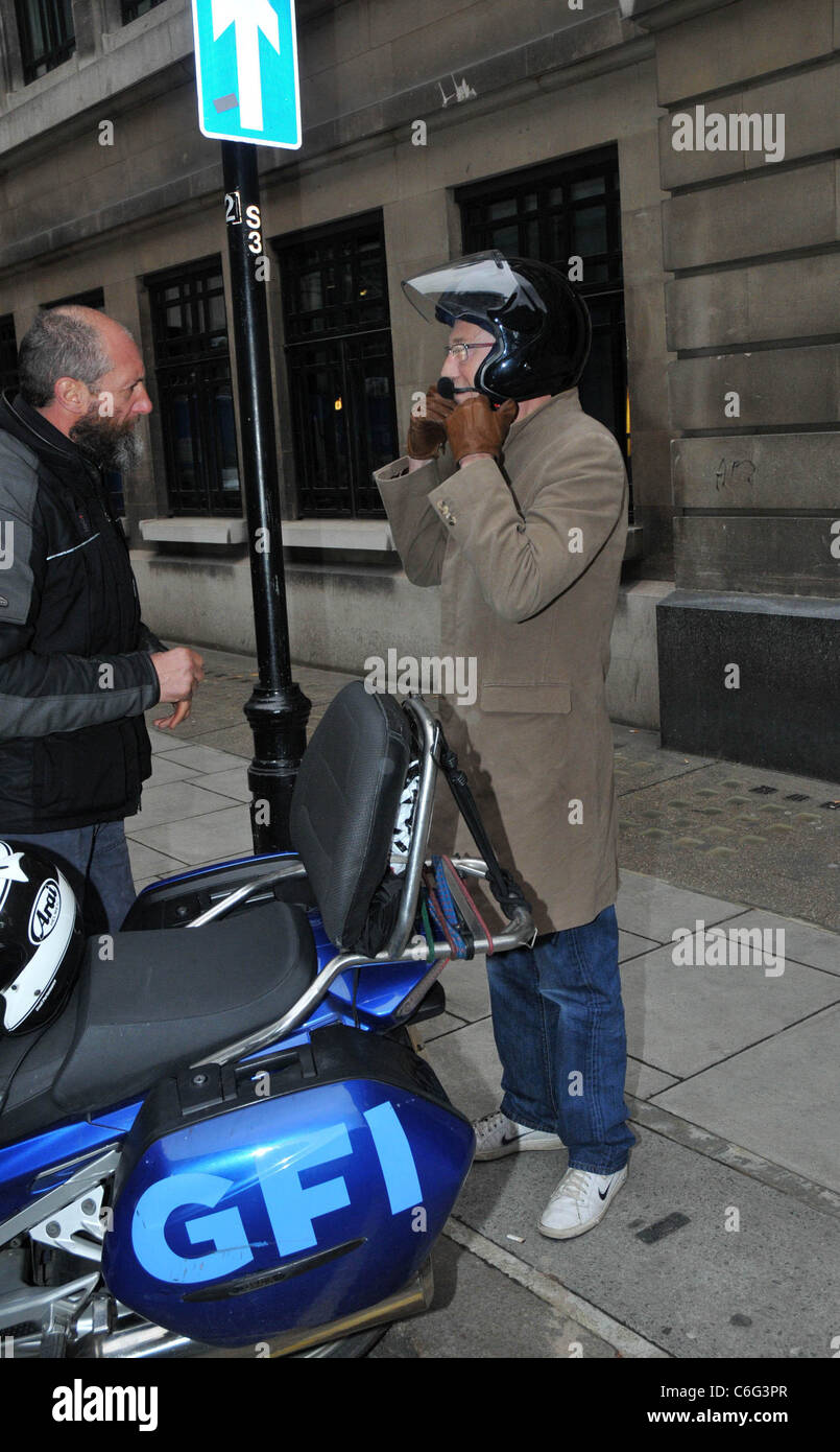 Paul O'Grady takes a 'Virgin Limobike' a London motorcycle taxi. London ...