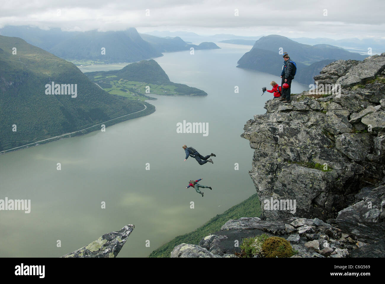 Base Jumpers Base Hopping from the summit of Gridsetskolten mountain in ...