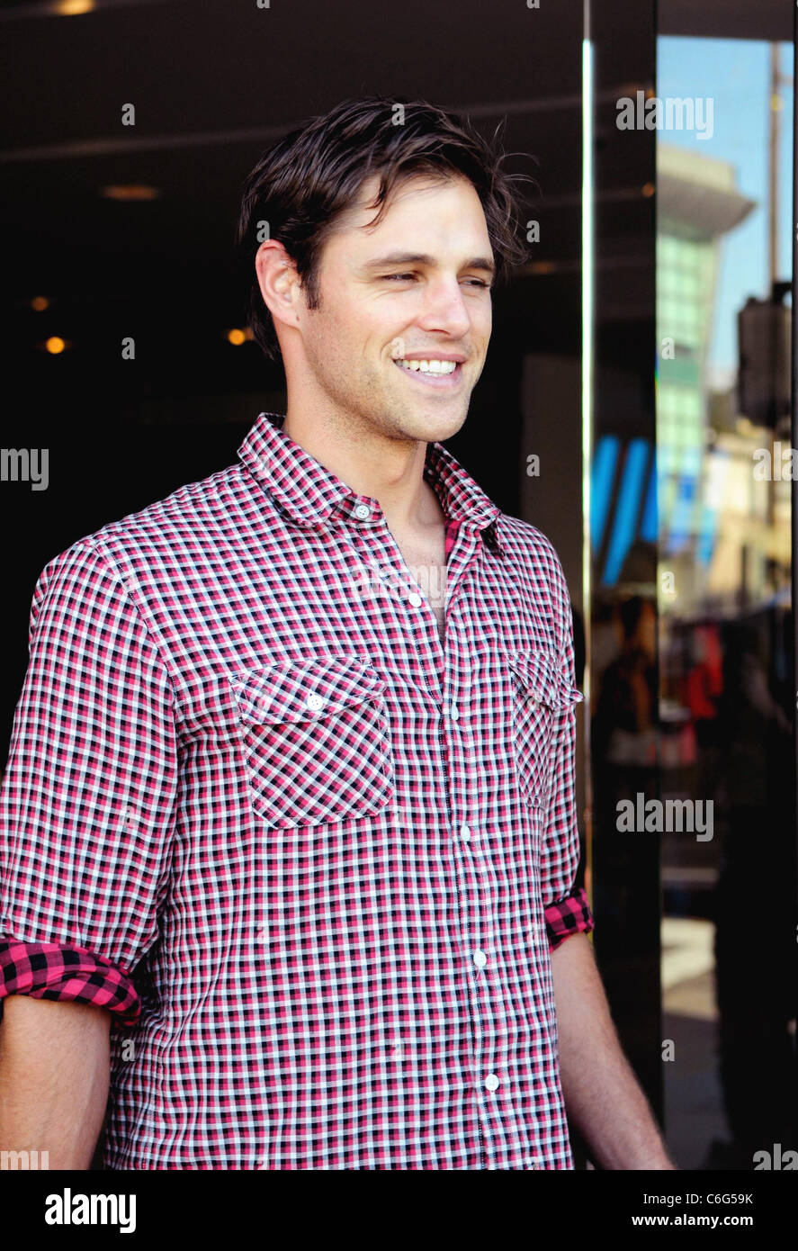 Actor Sam Page shopping at the new Armani Exchange store at Sunset Blvd ...