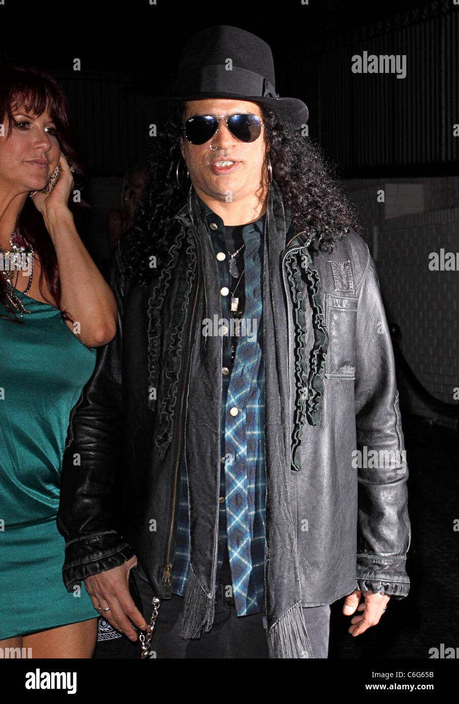 Slash arriving at pre oscars party at chateau marmont los angeles hi ...