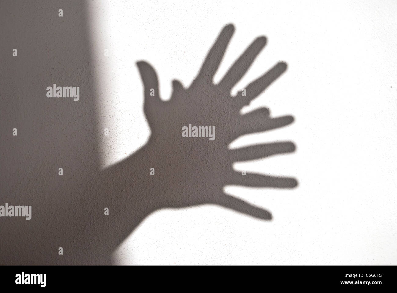 shadows of hands Stock Photo - Alamy