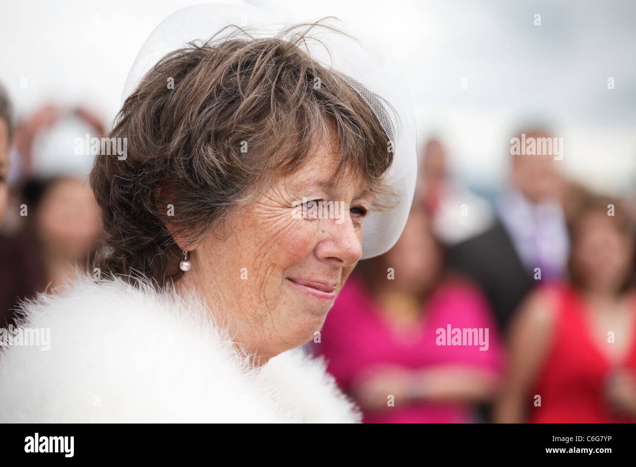 Middle aged woman at a wedding Stock Photo - Alamy