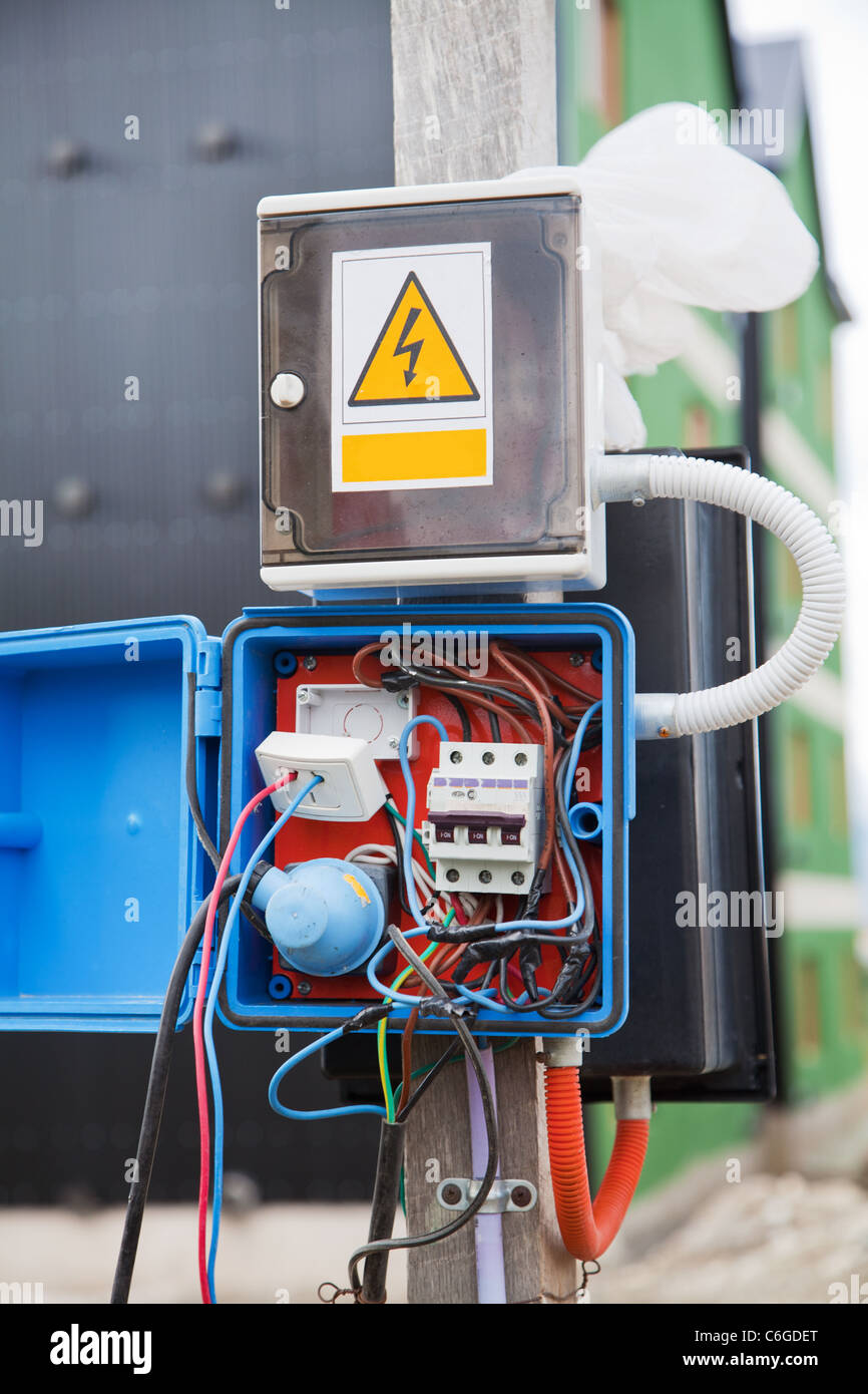 Outdoor box with dangerous electricity and many threads Stock Photo - Alamy