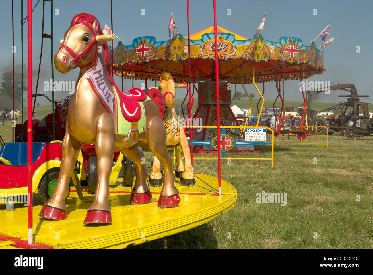 Funfair rides await customers as a summer rally in West Sussex Stock ...