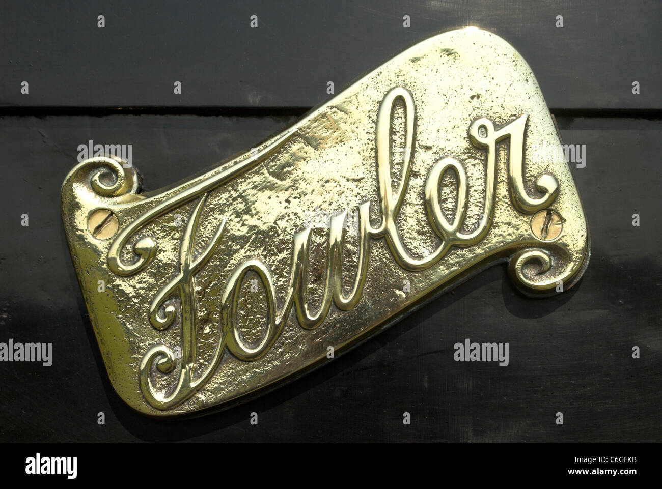 A Fowler emblem / badge displayed on a Fowler Steam Traction Engine ...