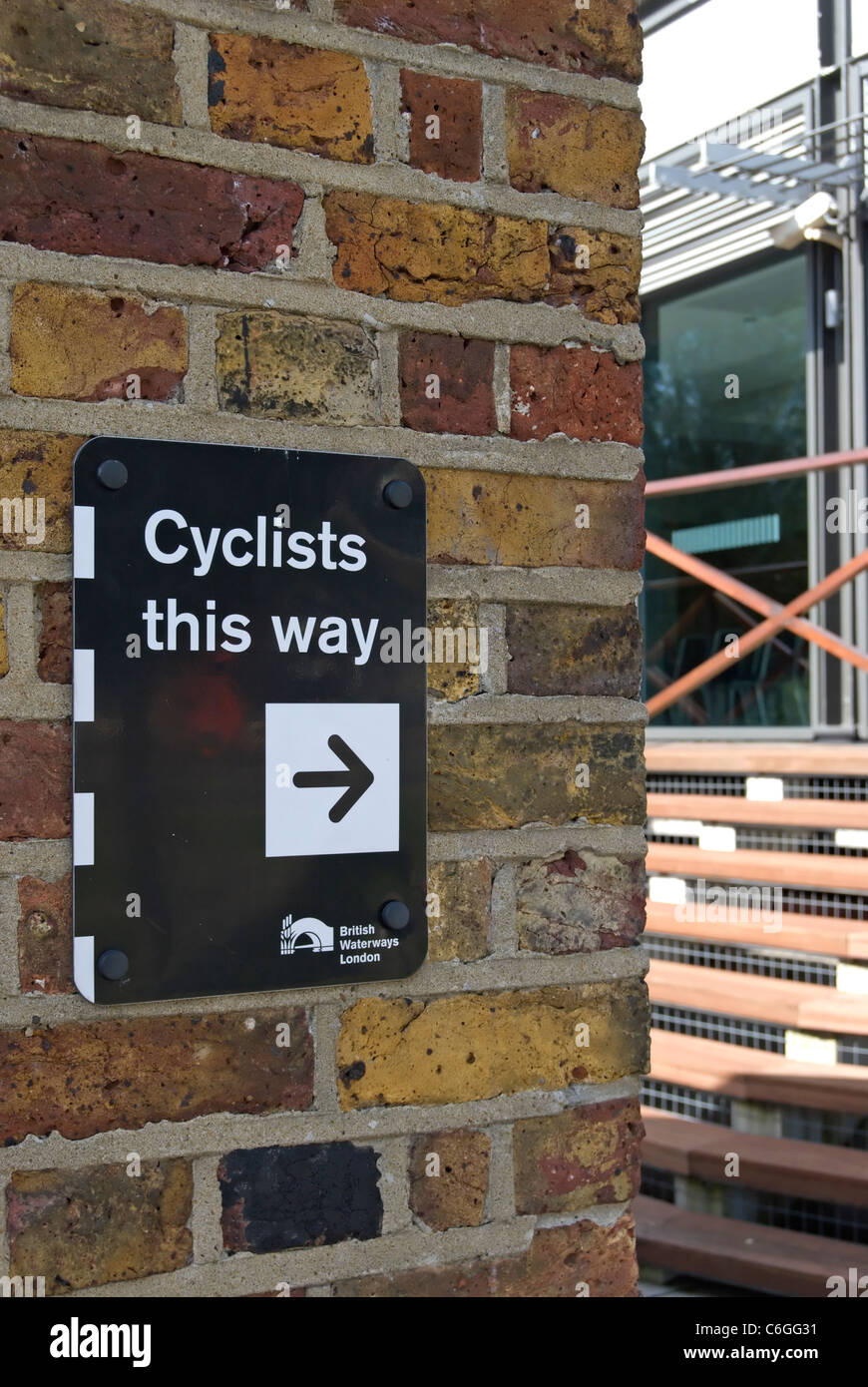 cyclists this way sign with right pointing arrow, at brentford lock ...