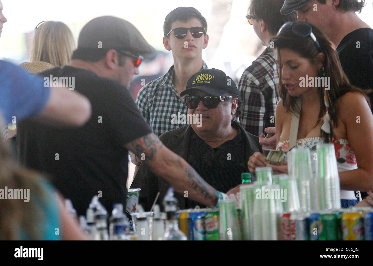 Danny DeVito wearing a hat promoting his TV show 'It's Always Sunny in ...