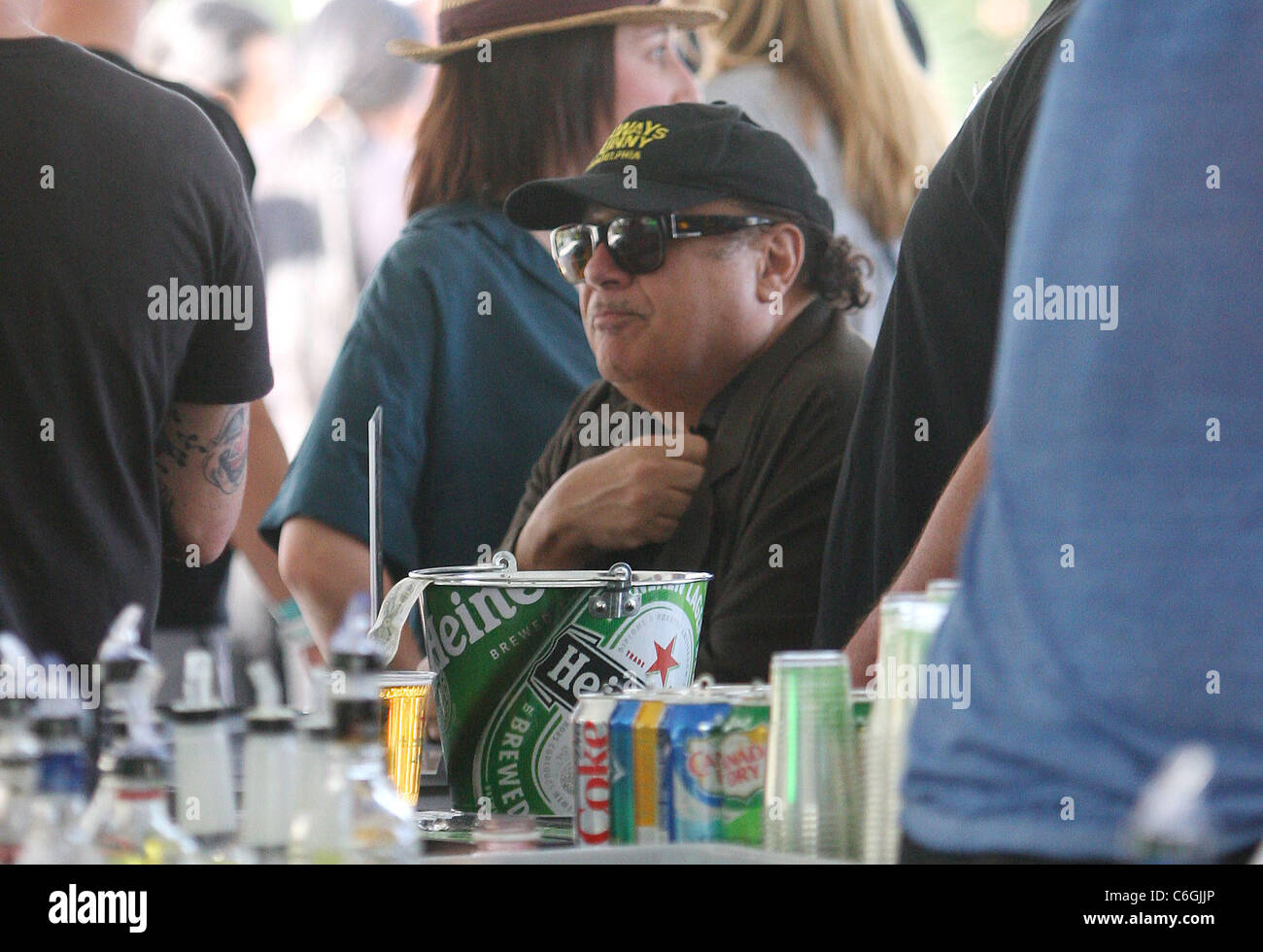 Danny DeVito wearing a hat promoting his TV show 'It's Always Sunny in ...