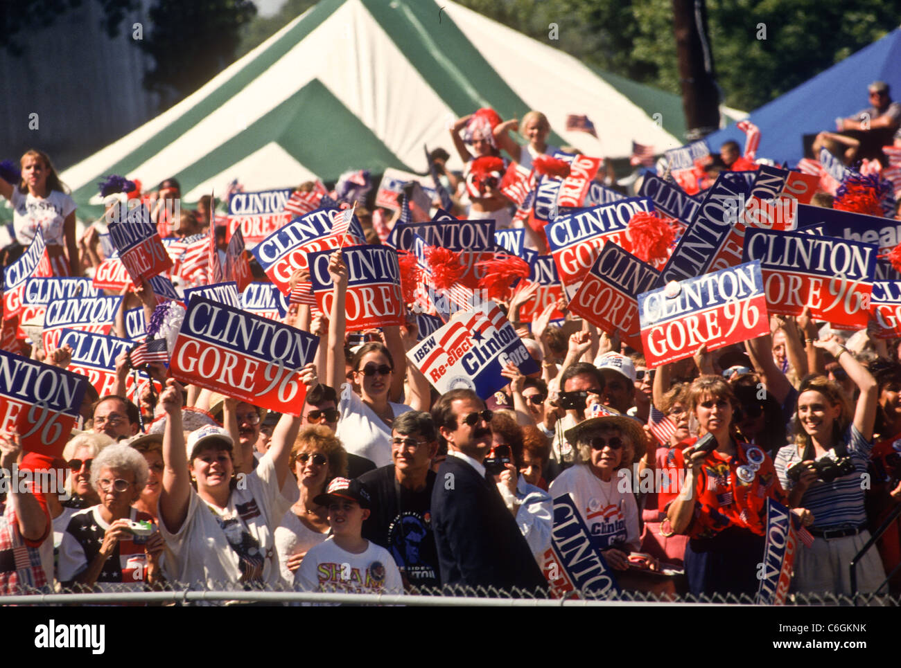 Supporters wave Clinton Gore signs as the train carrying President Bill ...