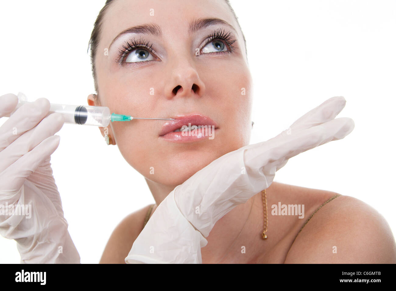 Cosmetic treatment with botox injection. White isolated Stock Photo - Alamy