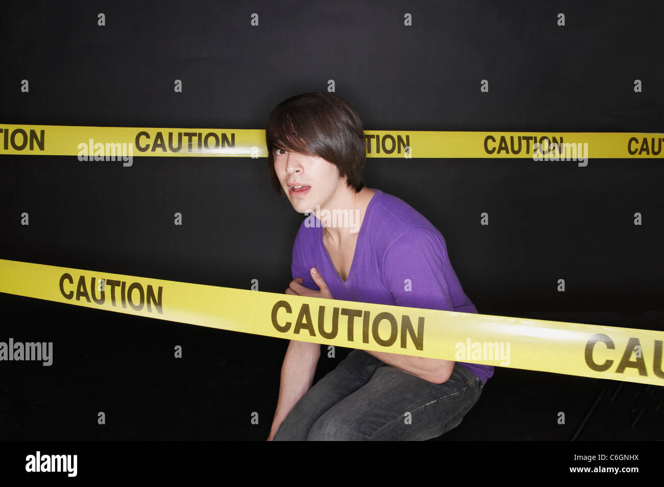 Caution Tape Man High Resolution Stock Photography and Images - Alamy
