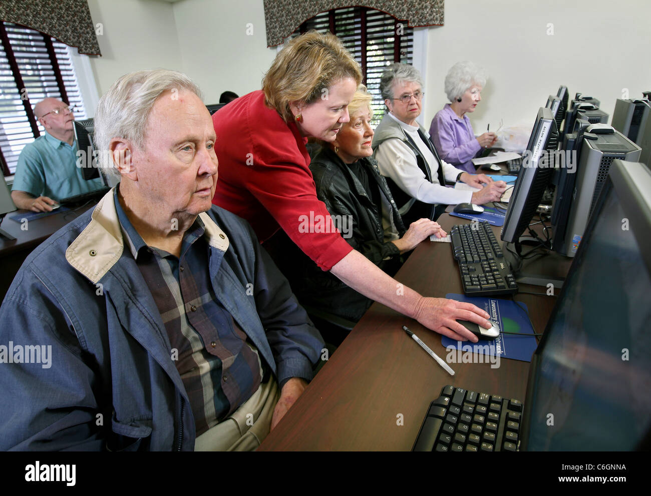 Senior citizens learn how to use computers and the Internet Stock Photo ...