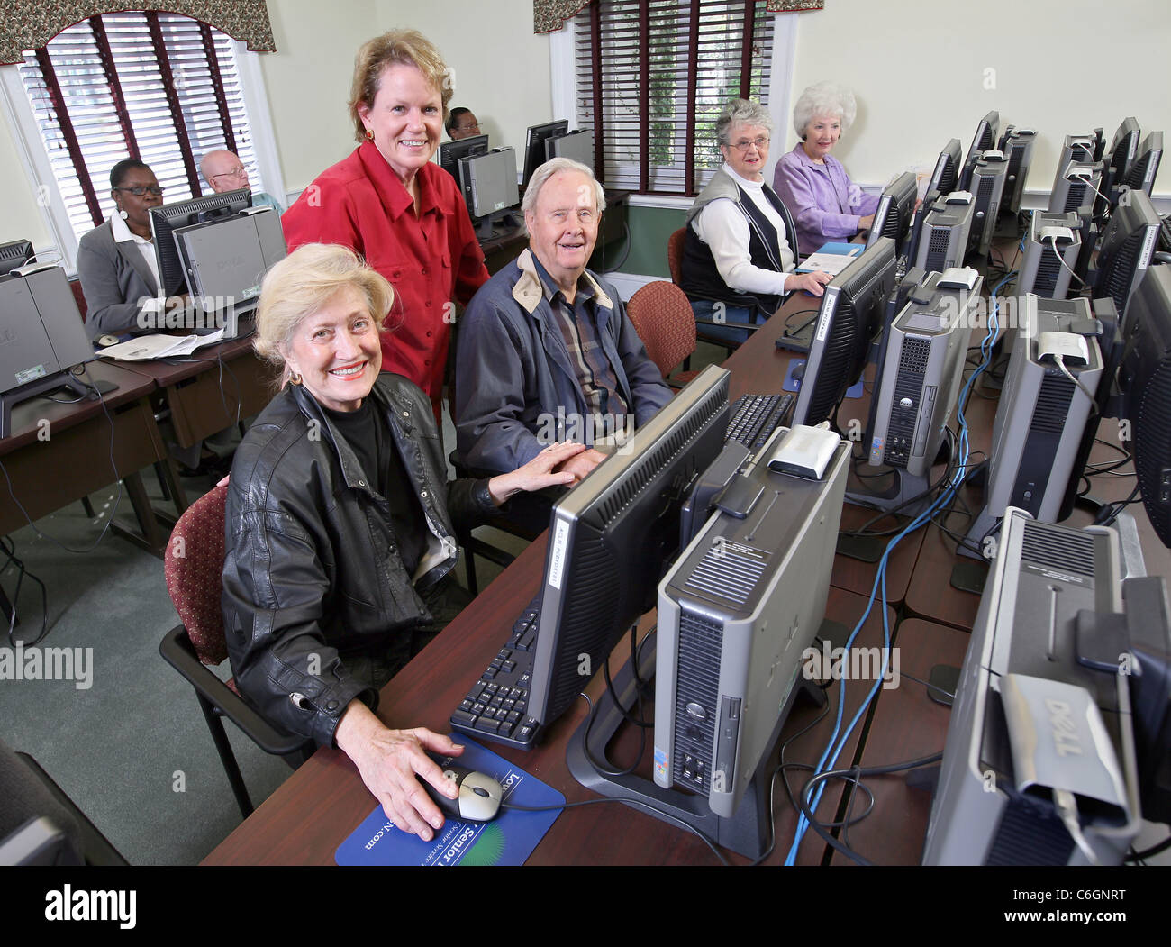 Senior citizens learn how to use computers and the Internet Stock Photo ...