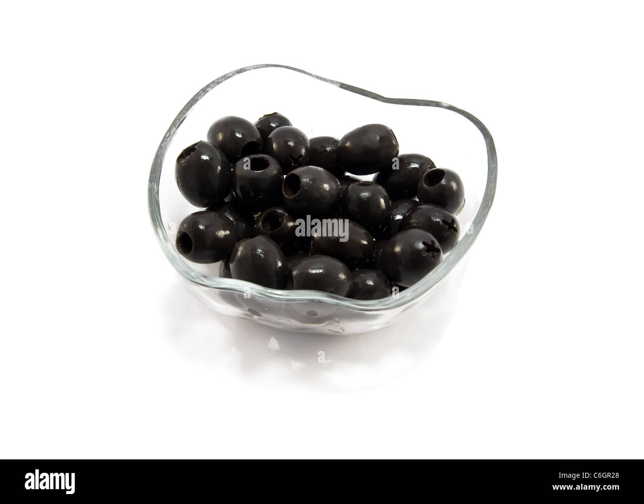 olives on a dish are isolated on white Stock Photo - Alamy