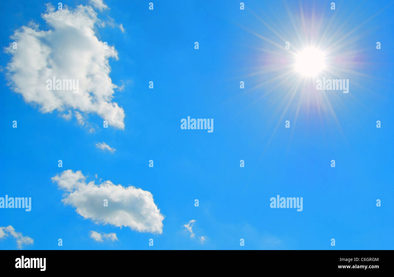 sun and white clouds in the sky Stock Photo - Alamy