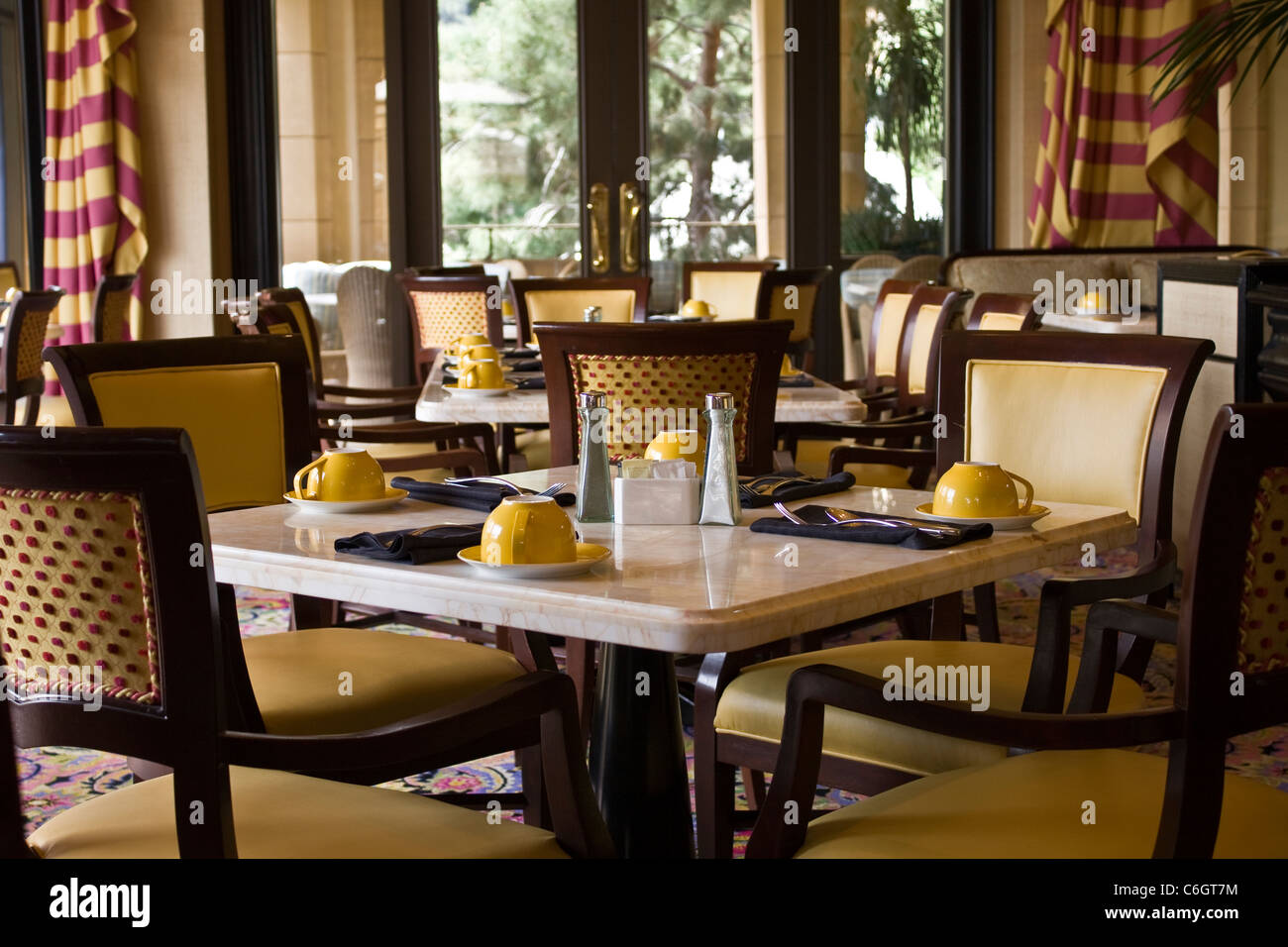 Classy and pleasant restaurant dining tables arrangement Stock Photo ...