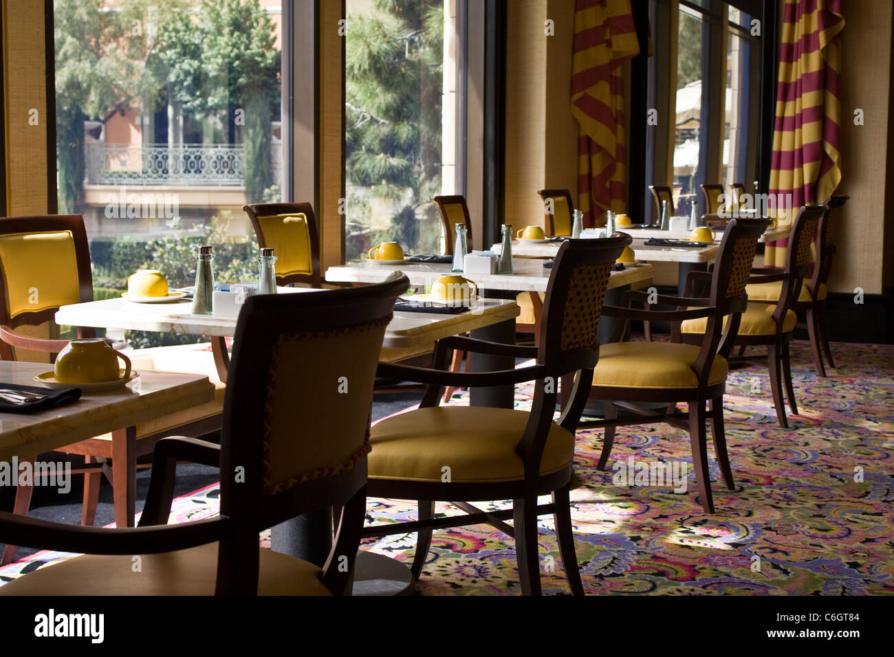 Classy and pleasant restaurant dining tables arrangement Stock Photo ...