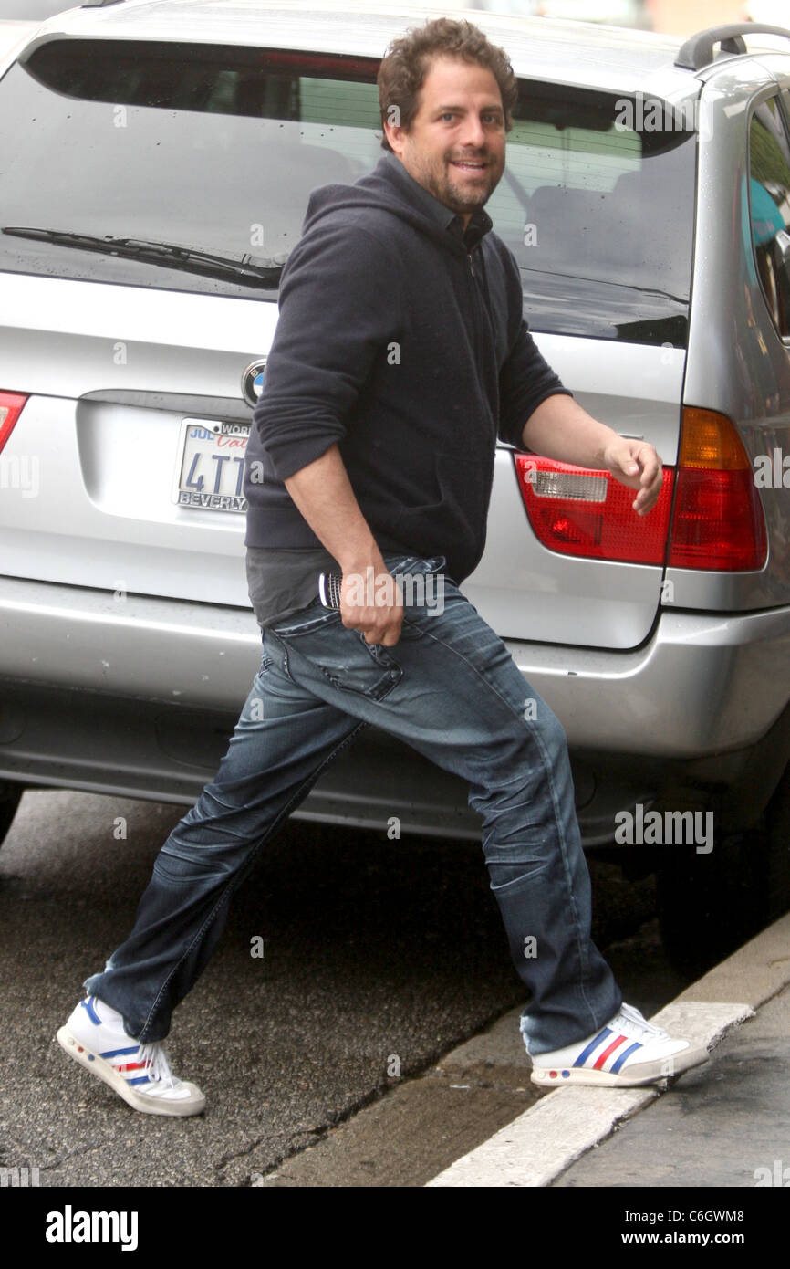 Brett Ratner American filmmaker and music video director stops to get a ...