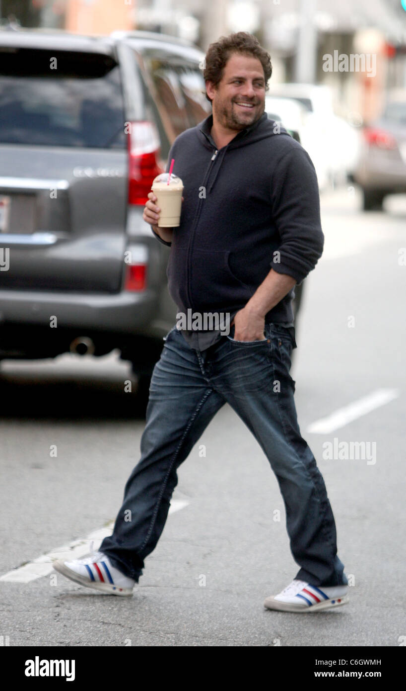 Brett Ratner American filmmaker and music video director stops to get a ...
