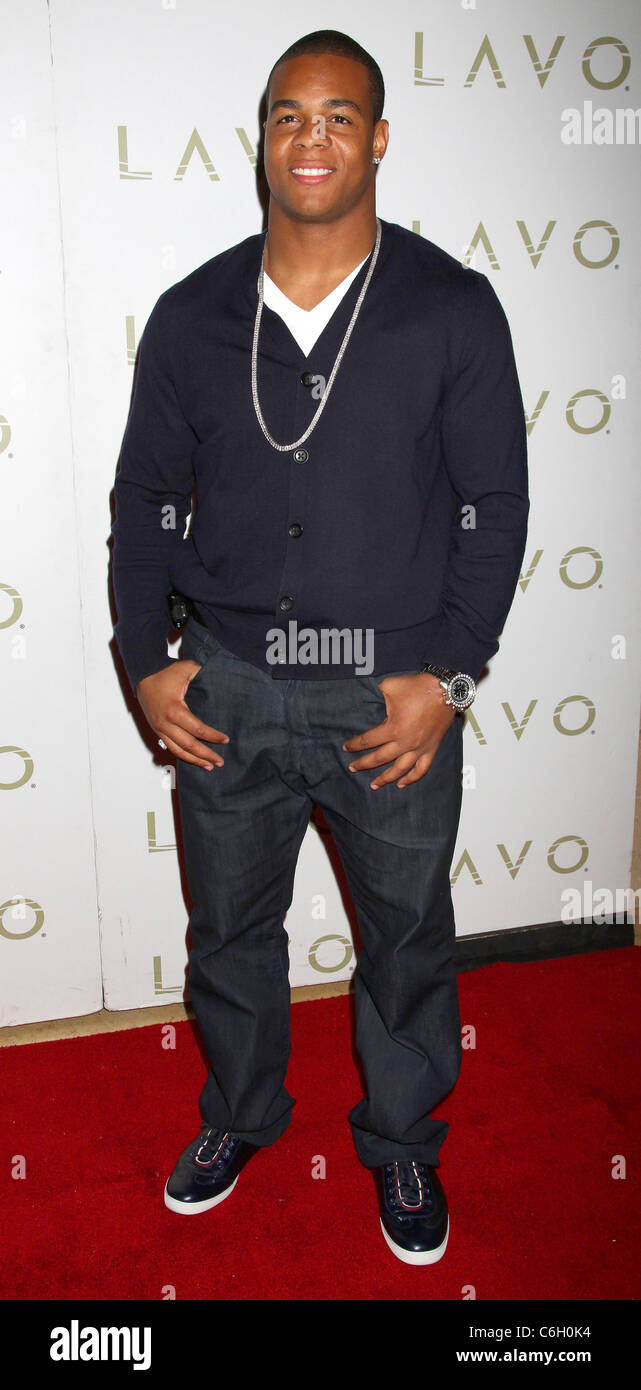 Superbowl champion Pierre Thomas of the New Orleans Saints hold a ...