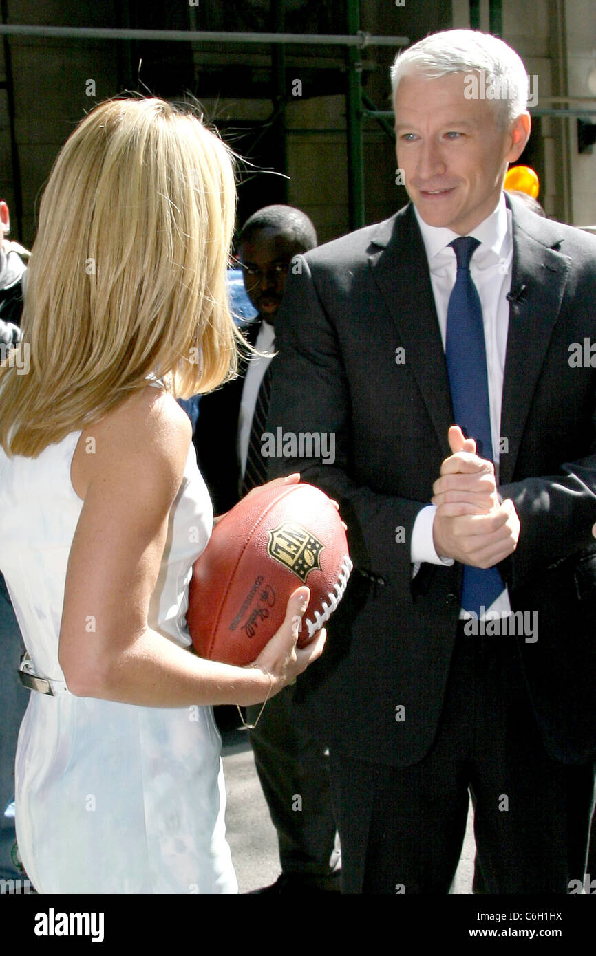 Kelly Ripa and Anderson Cooper filming a segment on the street for ABC ...