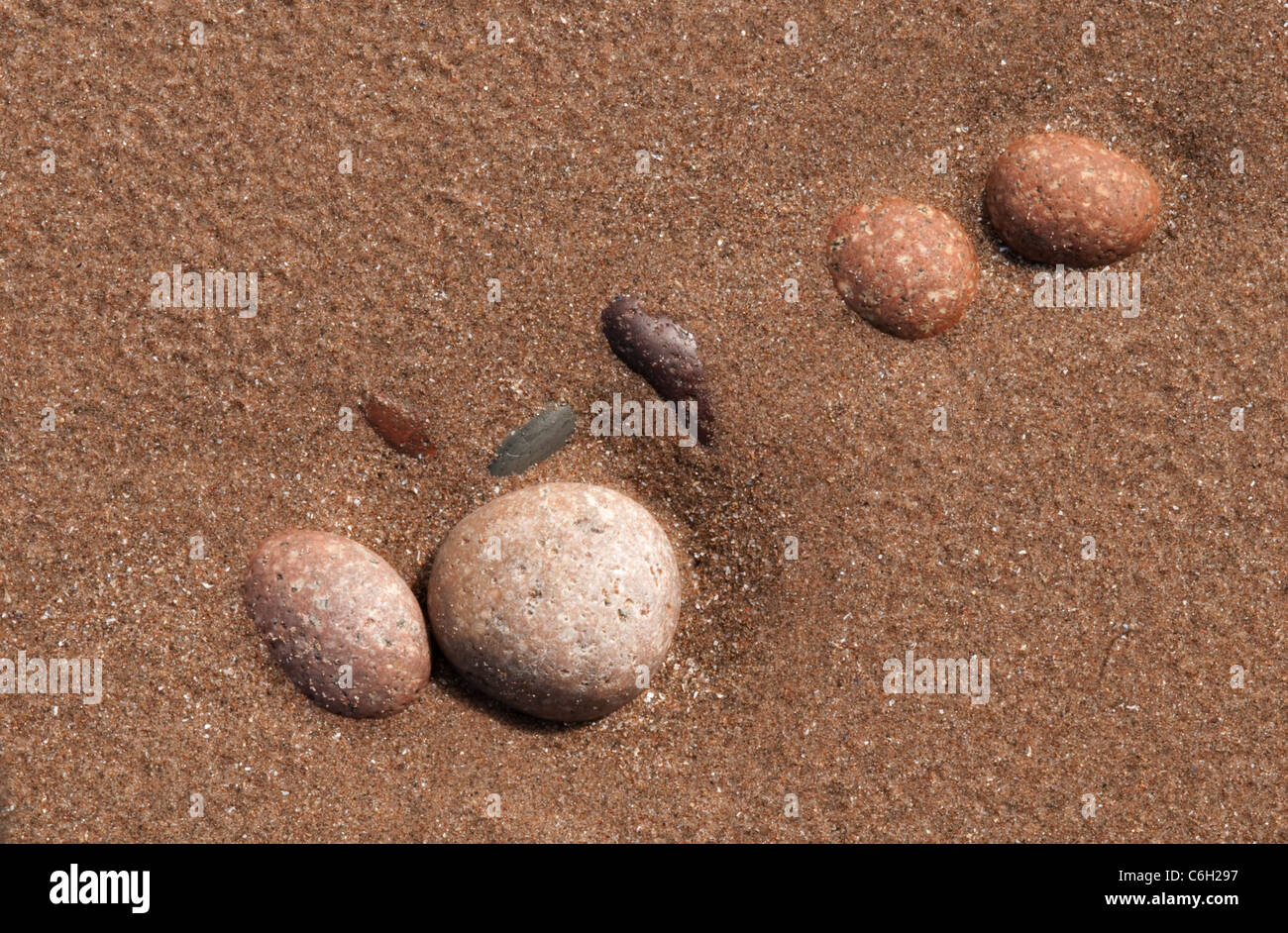 Pebbles on sandy beach at St Bees in Cumbria Stock Photo - Alamy