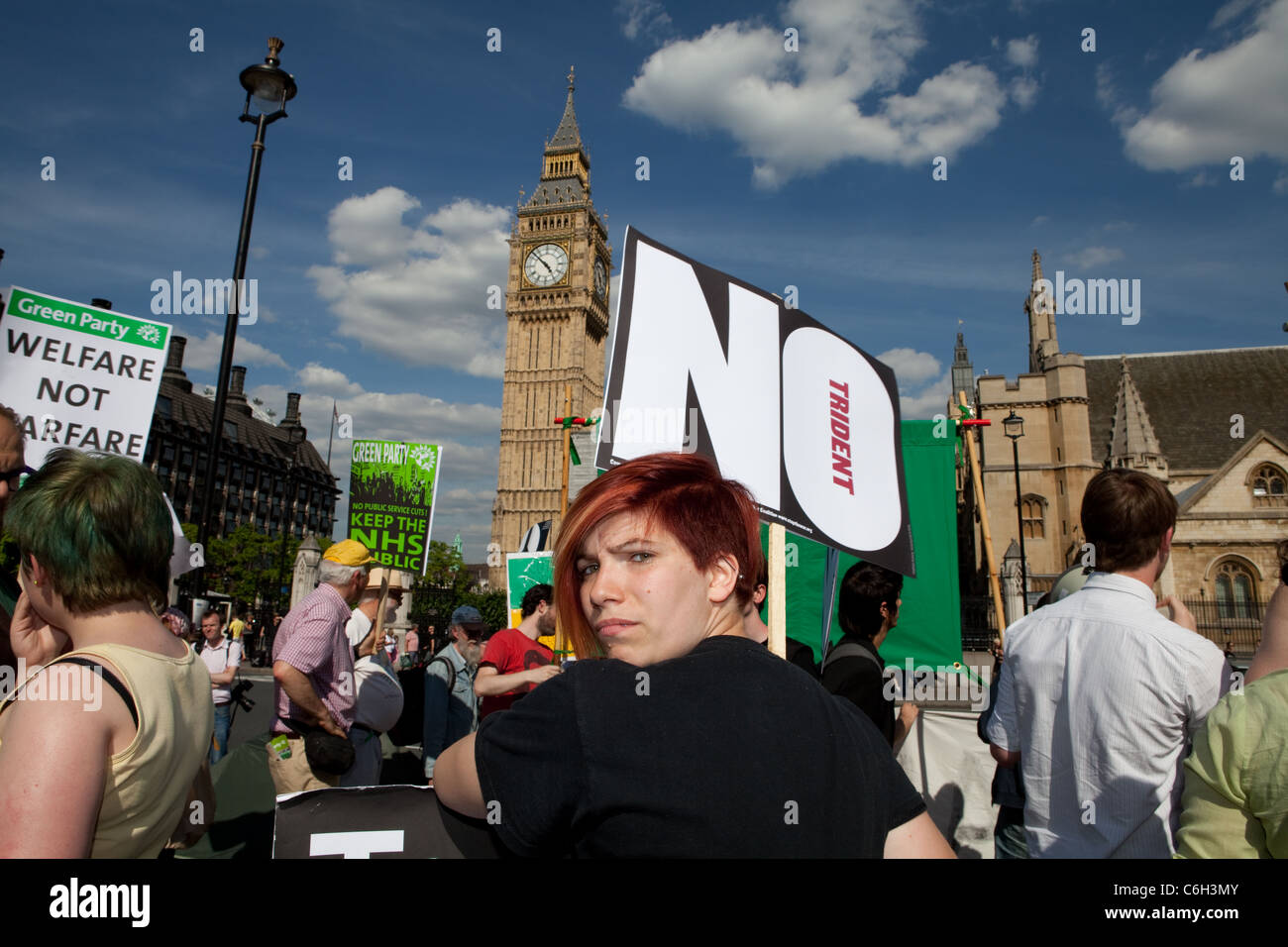 A protest on Parliament Square for budget day. People want less money ...