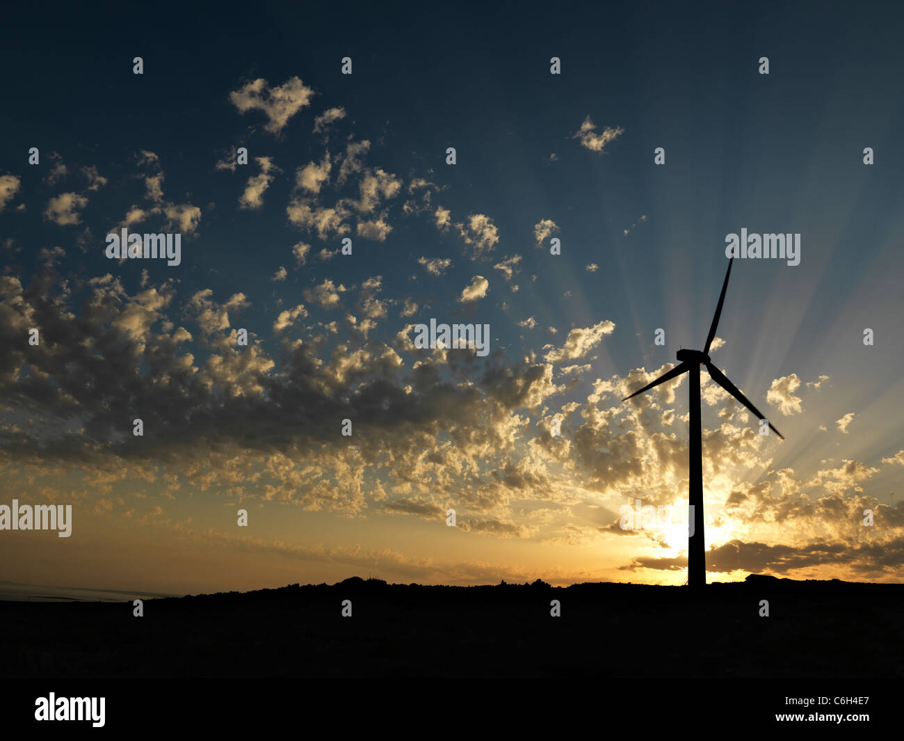 Wind energy on sunset Stock Photo - Alamy
