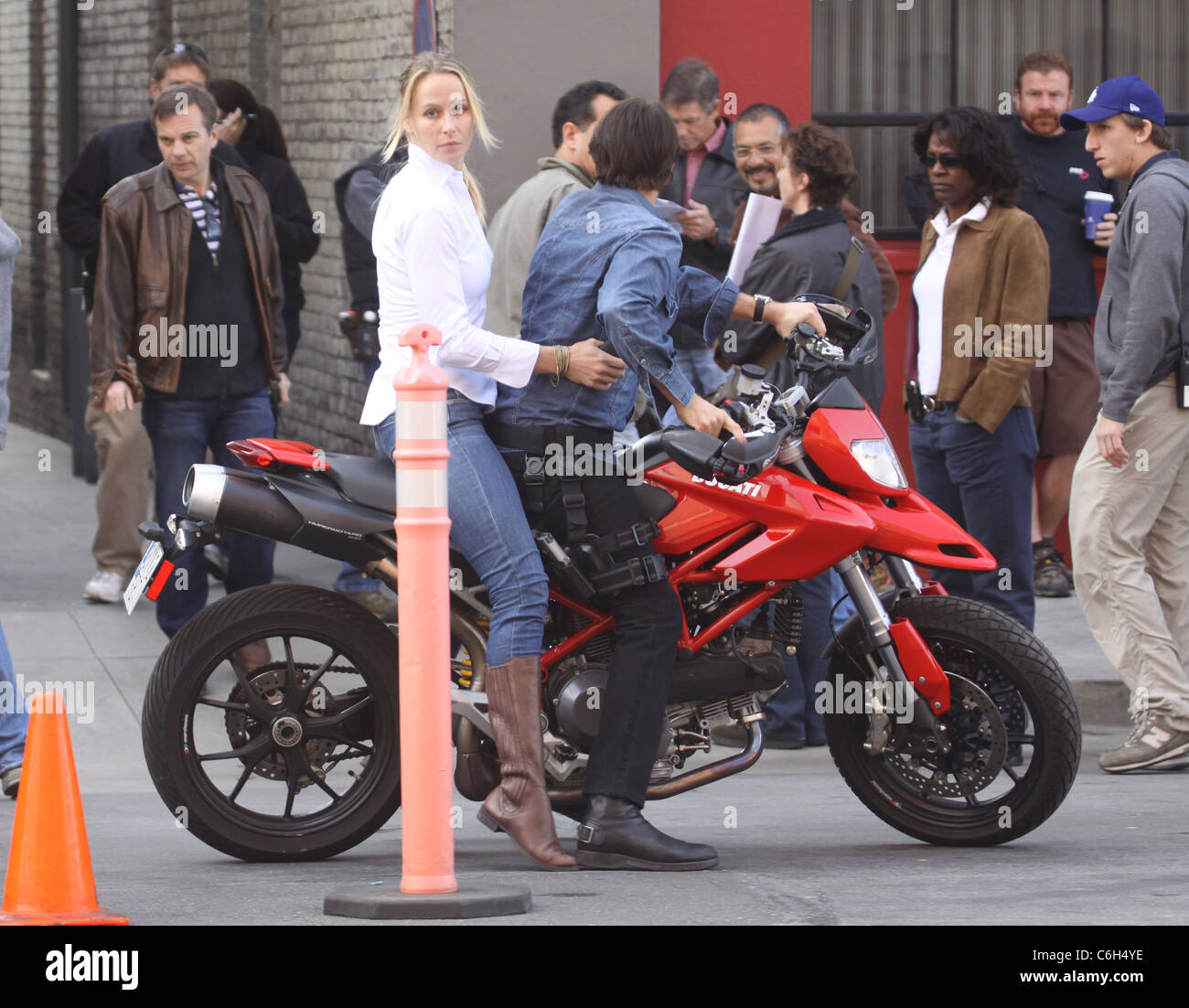 Stunt doubles for Tom Cruise and Cameron Diaz riding a motorcycle while ...
