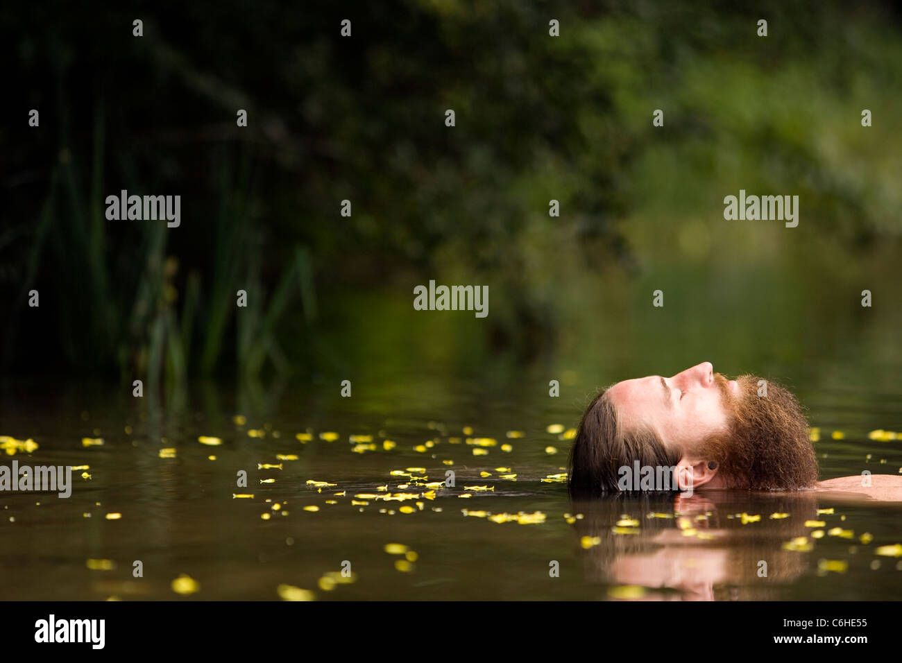 Man floating in water hi-res stock photography and images - Alamy