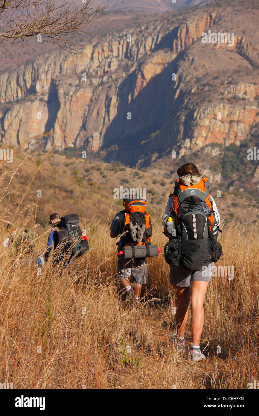 Hikers in mountain landscape Stock Photo - Alamy