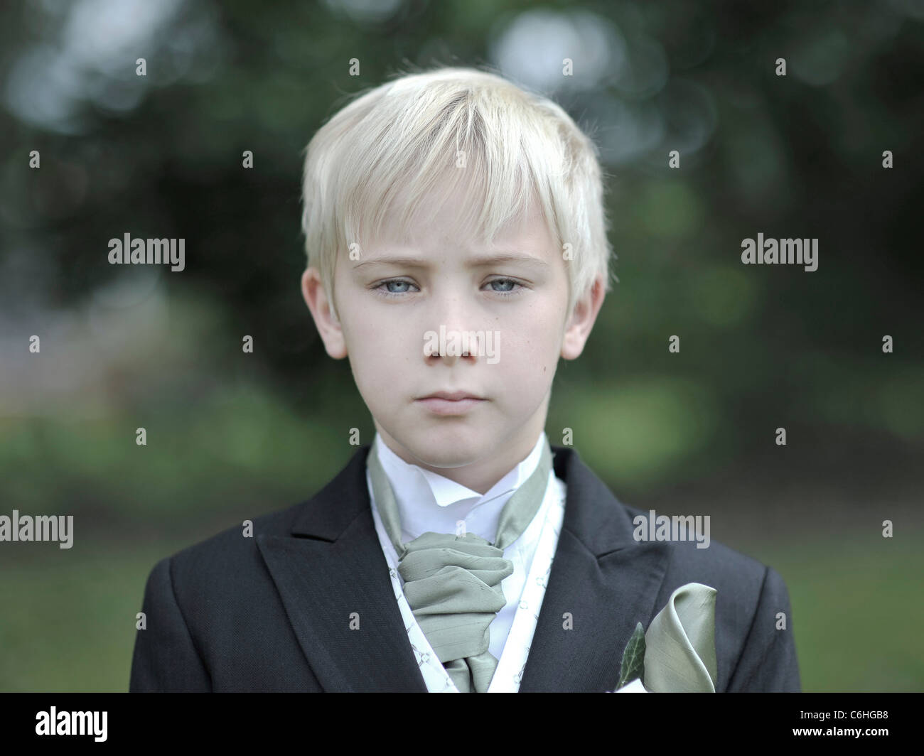 blonde boy wedding guest Stock Photo - Alamy