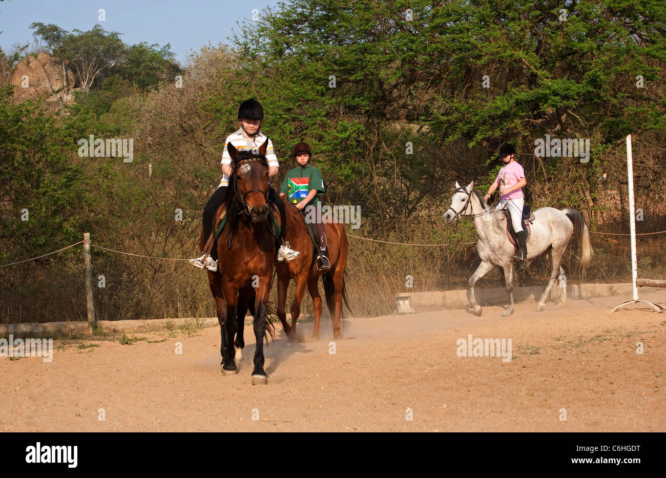 Children horse riding Stock Photo - Alamy