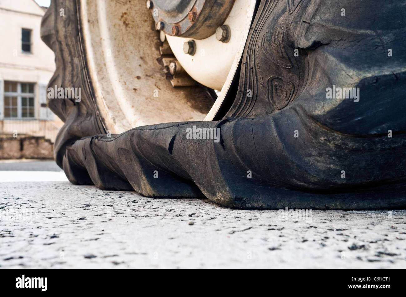 Punctured tractor tyre - France Stock Photo - Alamy
