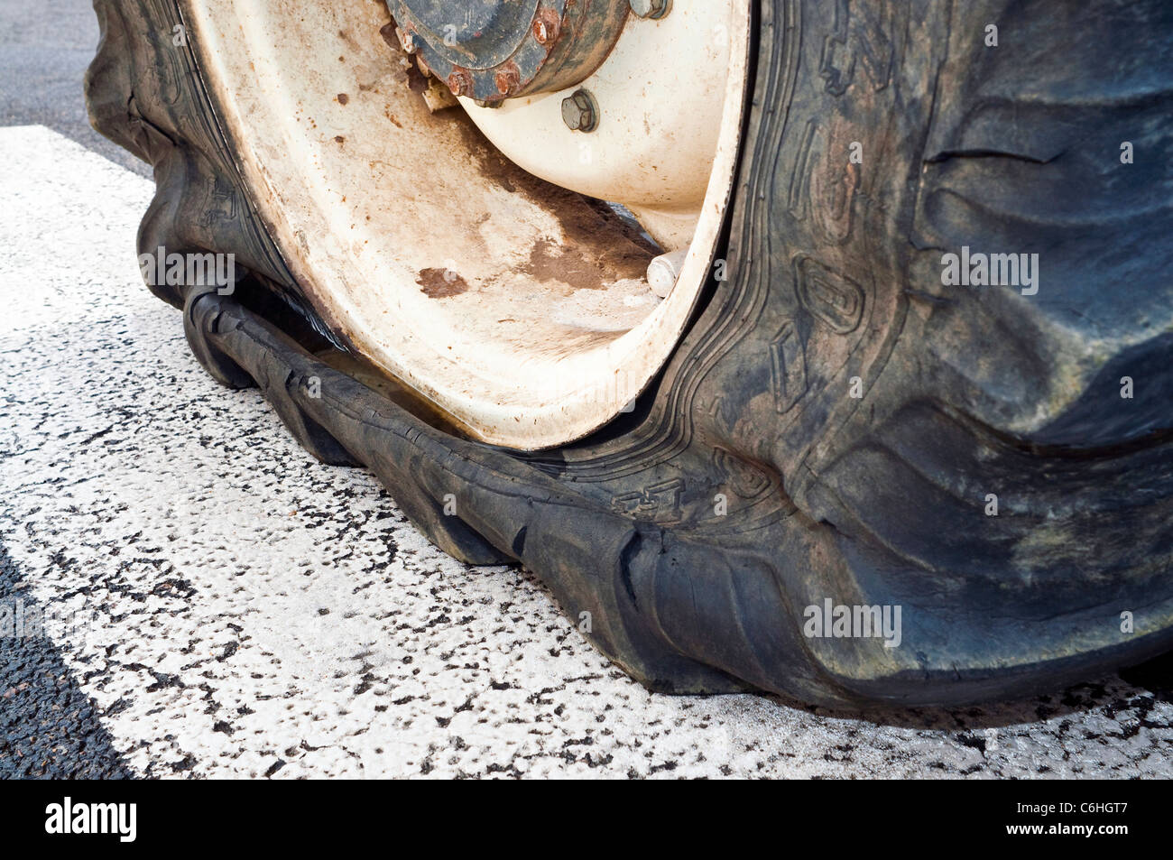 Punctured tractor tyre - France Stock Photo - Alamy