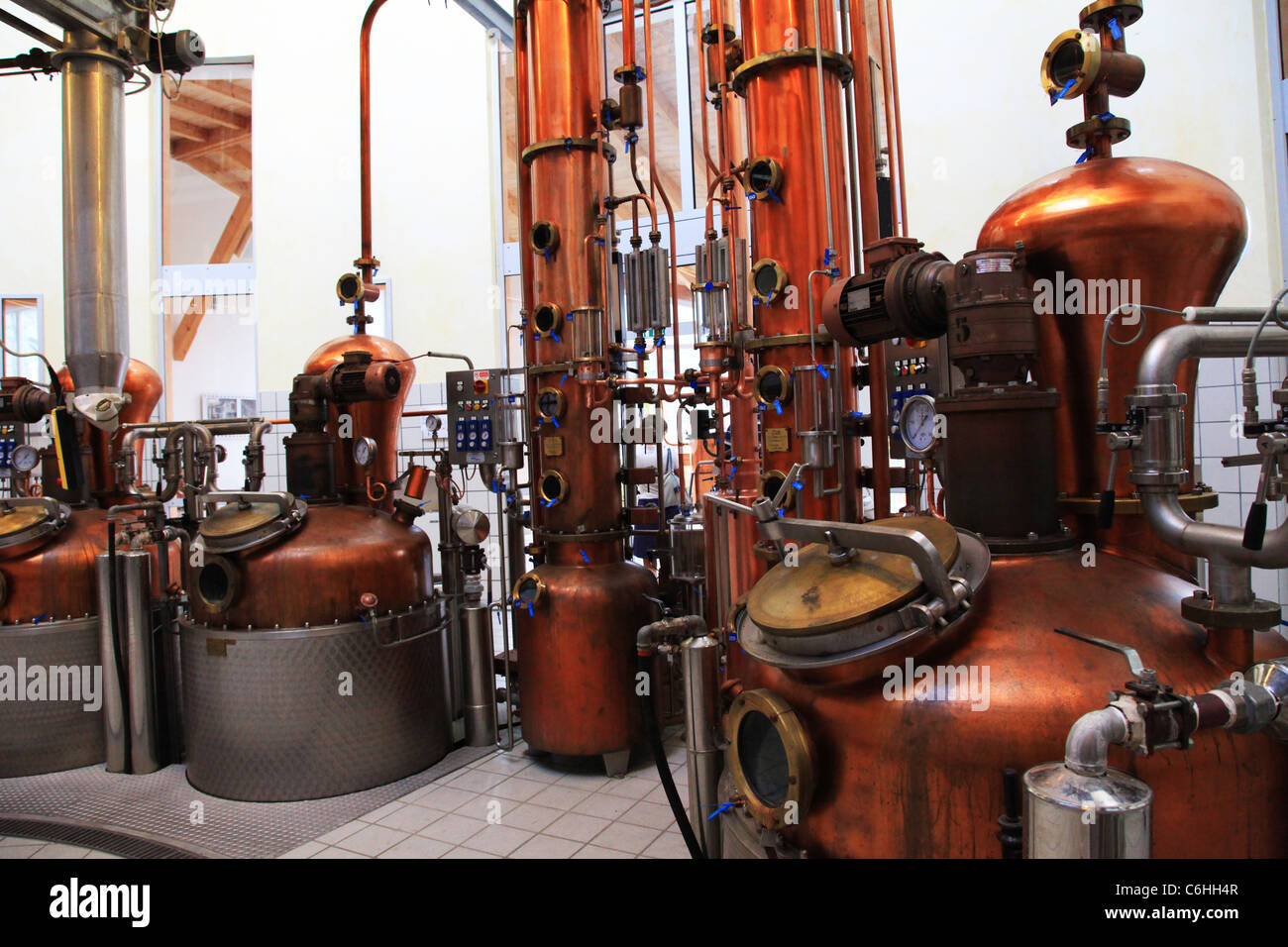 The Distillation of grappa using copper machinery Stock Photo - Alamy