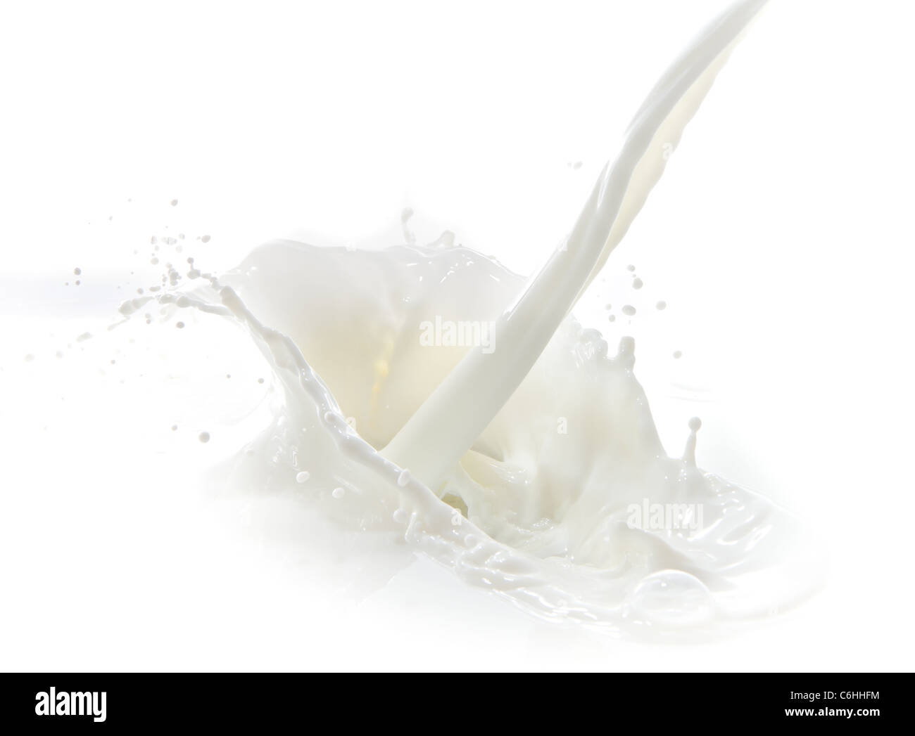 pouring milk splash isolated on white background Stock Photo - Alamy