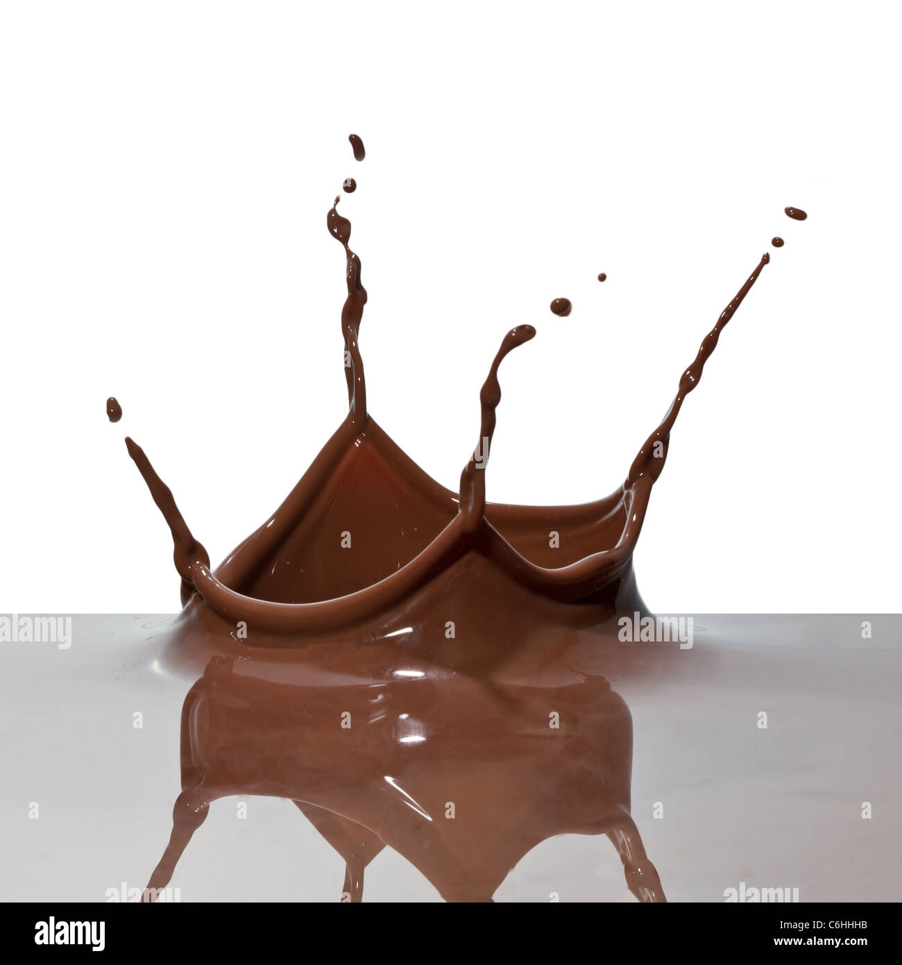 chocolate splash closeup isolated on white background Stock Photo - Alamy