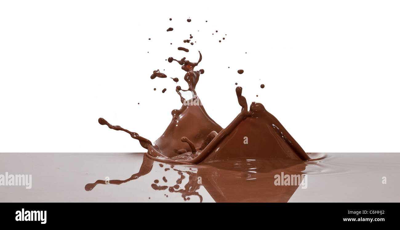 chocolate splash closeup isolated on white background Stock Photo - Alamy